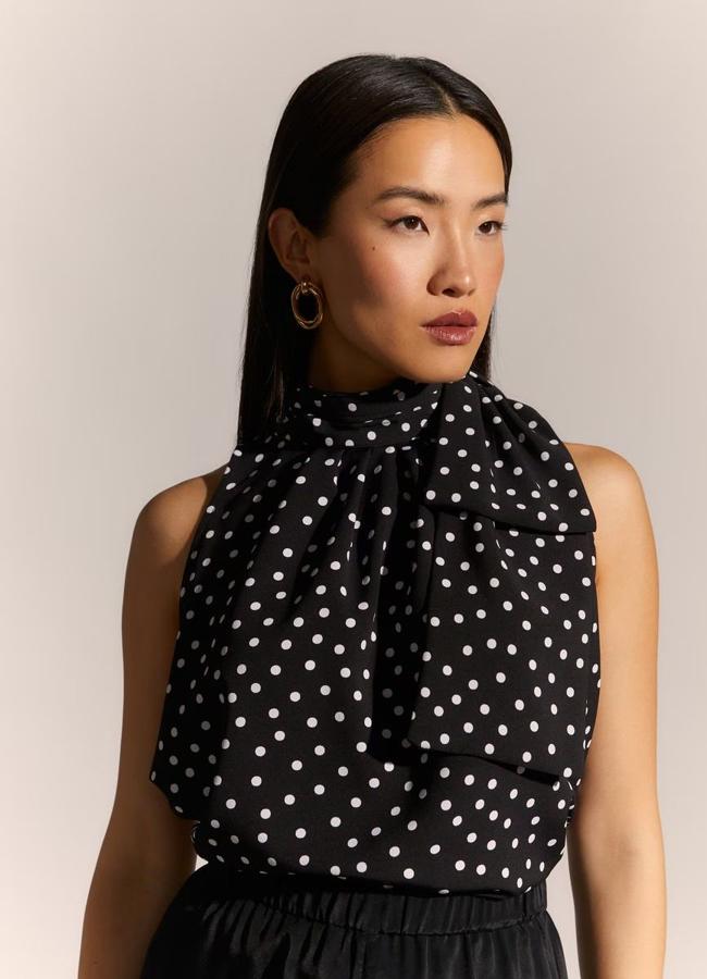 Tops halter muy elegantes para elevar tus looks de Navidad | Mujerhoy